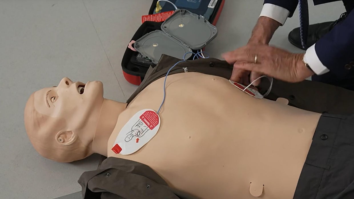 How to use an automated external defibrillator (AED) on someone in cardiac arrest - CBS News