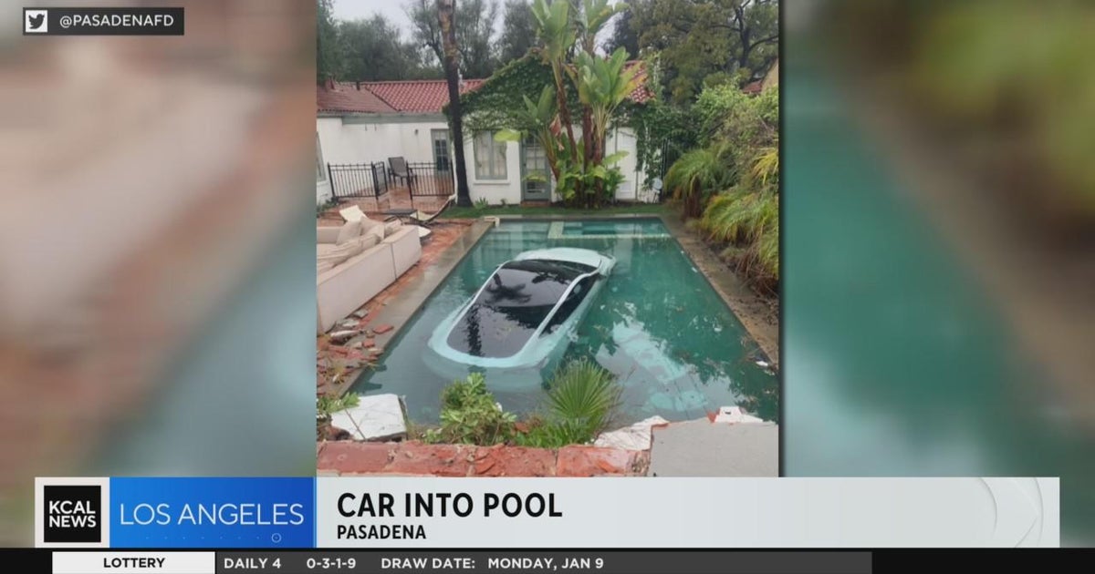 Tesla crashes into pool in Pasadena - CBS Los Angeles