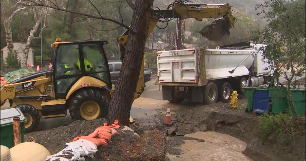 Flood-prone canyons in Orange County hit with mud, debris flow after ...