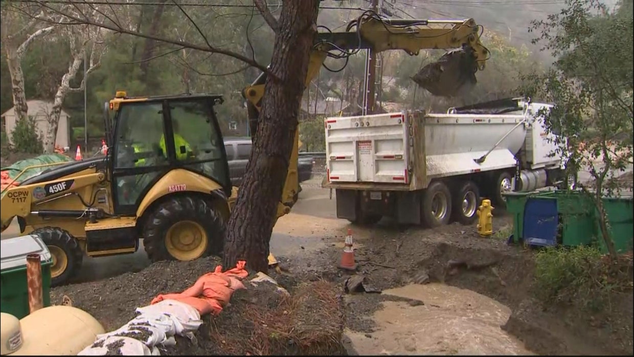 Flood-prone canyons in Orange County hit with mud, debris flow after ...
