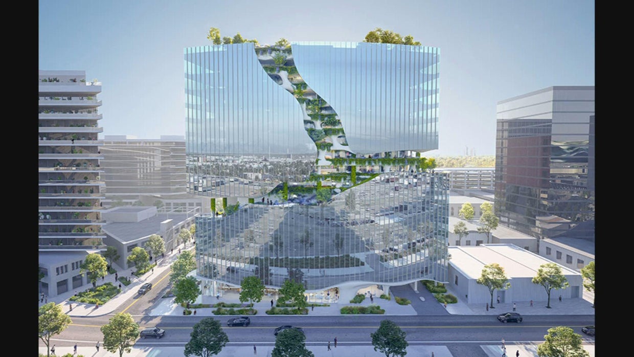 New building in Denver embracing the natural world with a canyon carved ...
