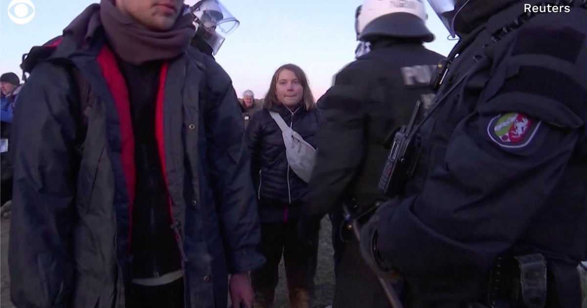 Greta Thunberg seen being carried away from coal mining protest by ...
