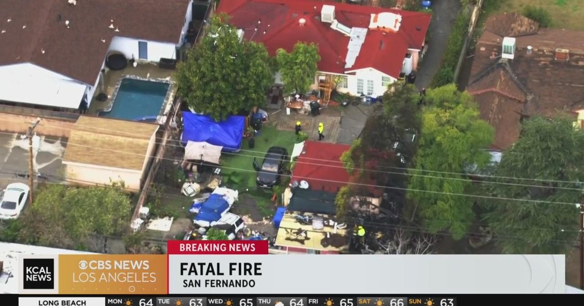 Firefighters find dead man inside burned RV in San Fernando yard - CBS ...