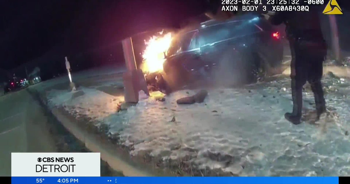 Caught on Camera: Wyandotte police rescue suspect in fiery crash - CBS ...