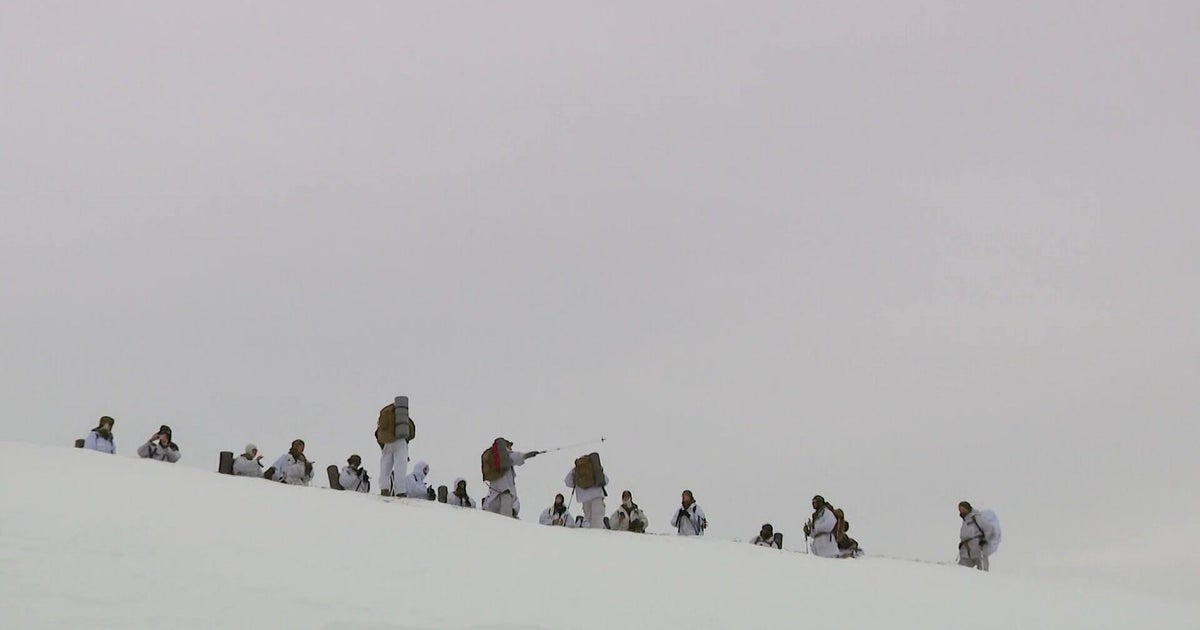 Minnesota National Guard troops build ice walls, snow caves to endure ...