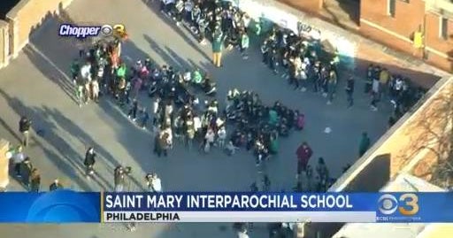 Students gather on roof of school for an Eagles pep rally - CBS ...
