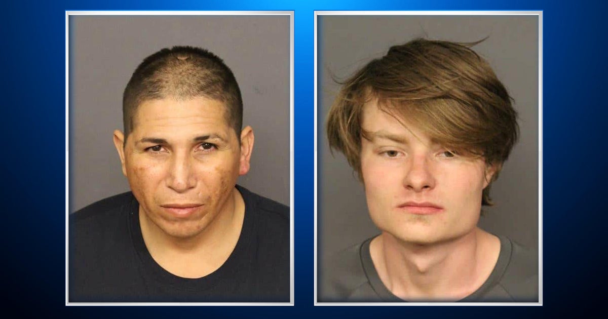 2 arrested in deadly shooting after man's body found in parking lot ...