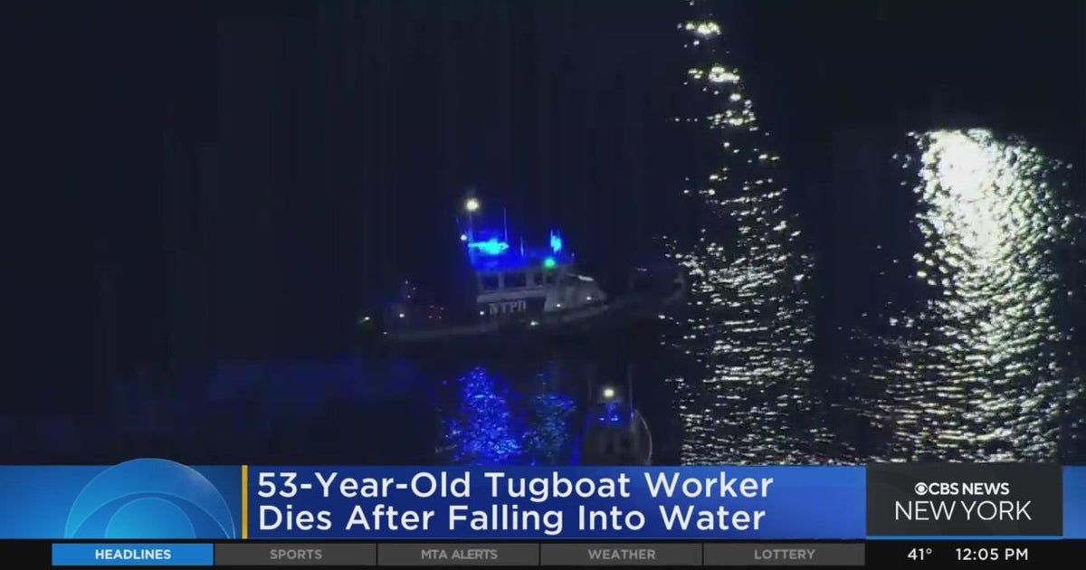 Tugboat worker dies after falling into water - CBS New York