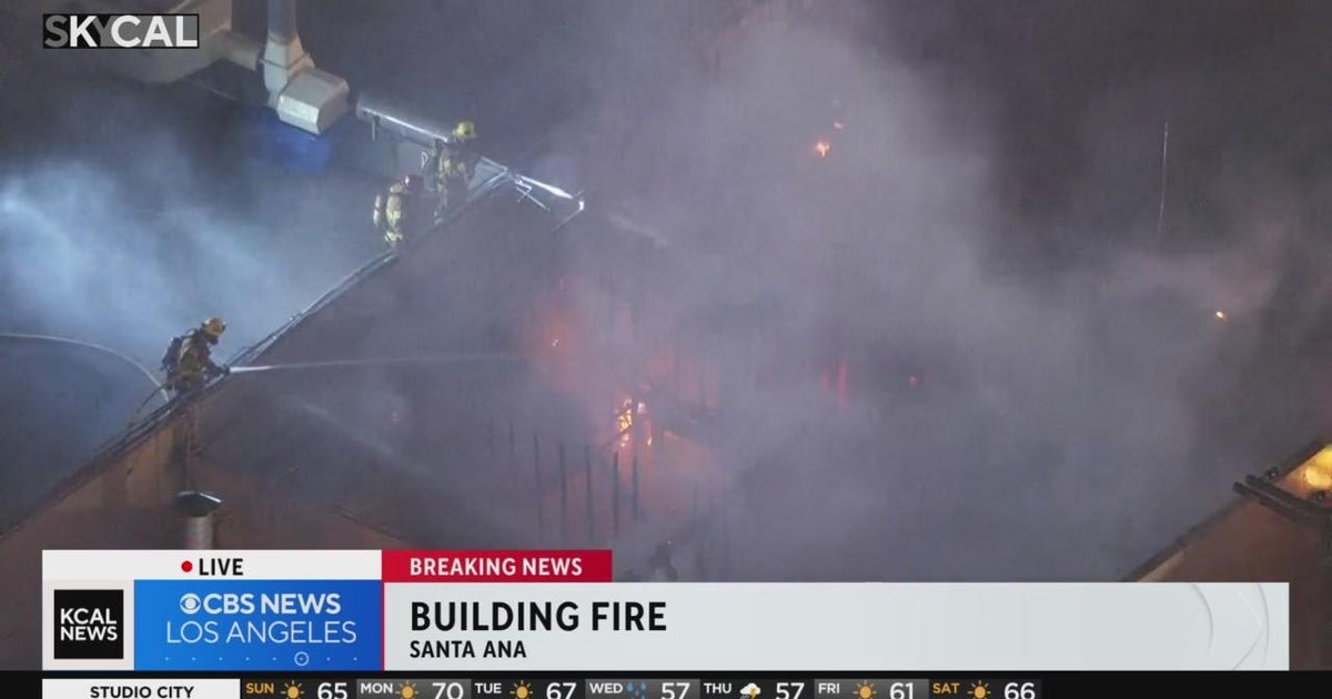 Firefighters respond to three-alarm fire at commercial building in ...