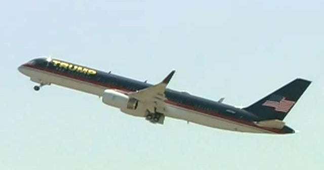 Trump boards flight for New York to face indictment - CBS News