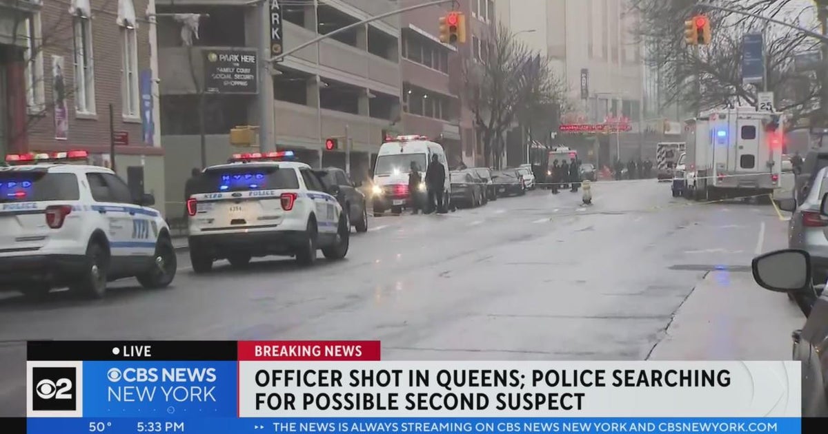 Officer shot in Queens; police searching for possible second suspect ...