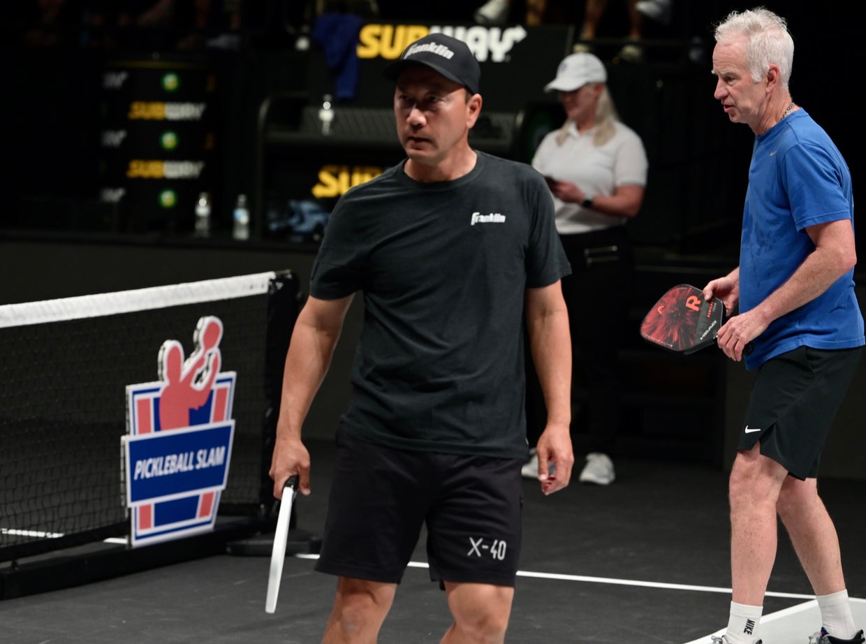 Pickleball explodes in popularity, starting turf wars - CBS News