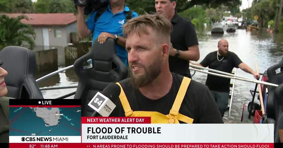 Boats, swamp buggies used to rescue people trapped by flood waters ...