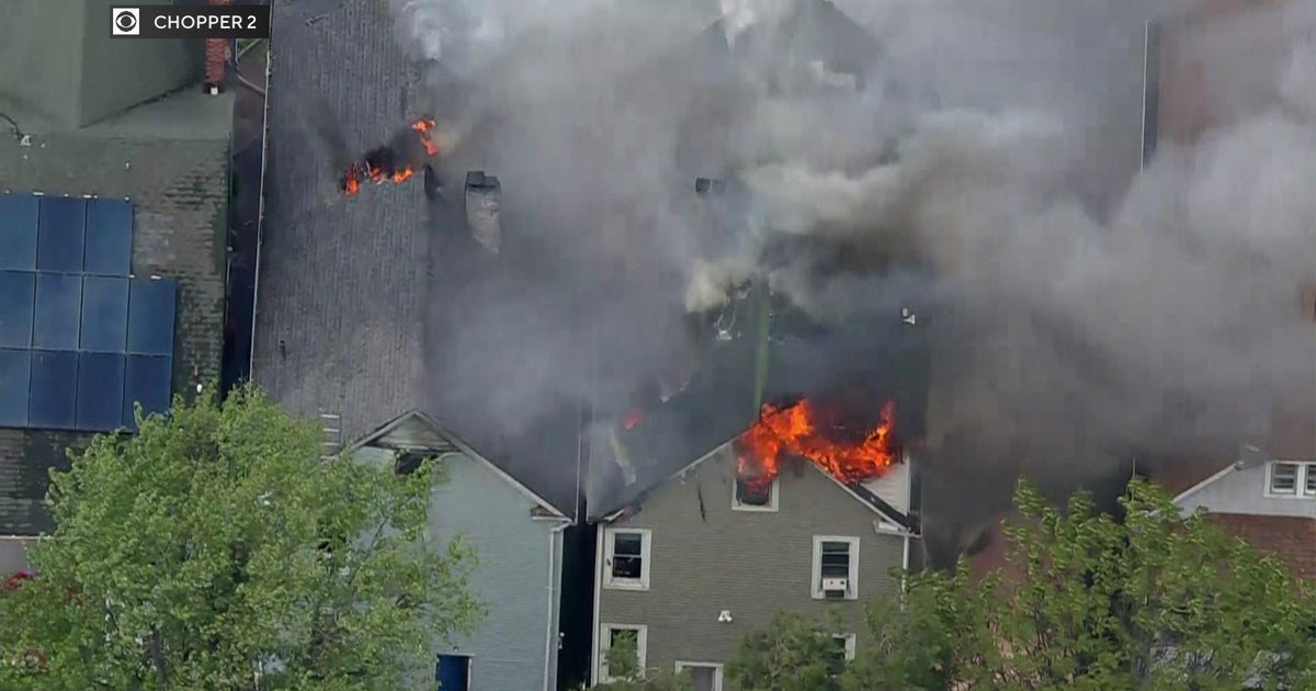 2 homes damaged by fire in Paterson - CBS New York