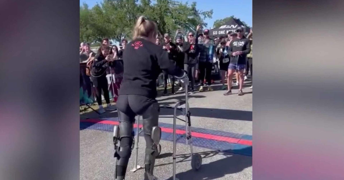 Woman paralyzed in accident walks a mile for first time in more than 5 ...