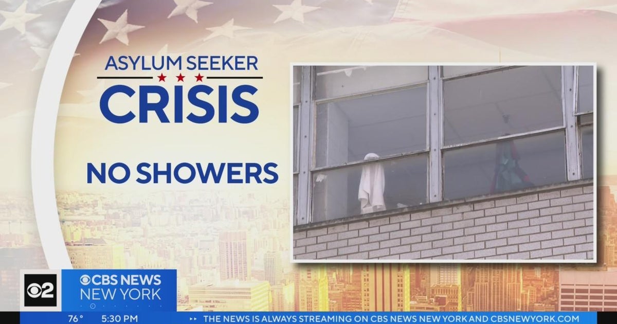 Temporary shelter for asylum seekers has no showers - CBS New York