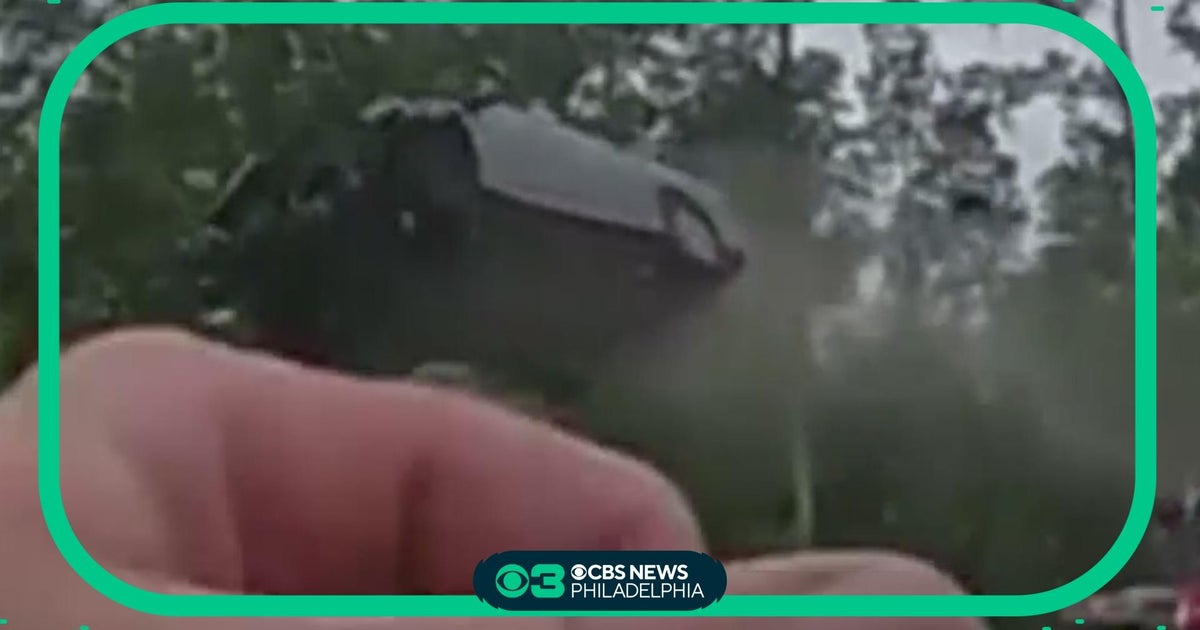 Car goes airborne after hitting tow truck - CBS Philadelphia