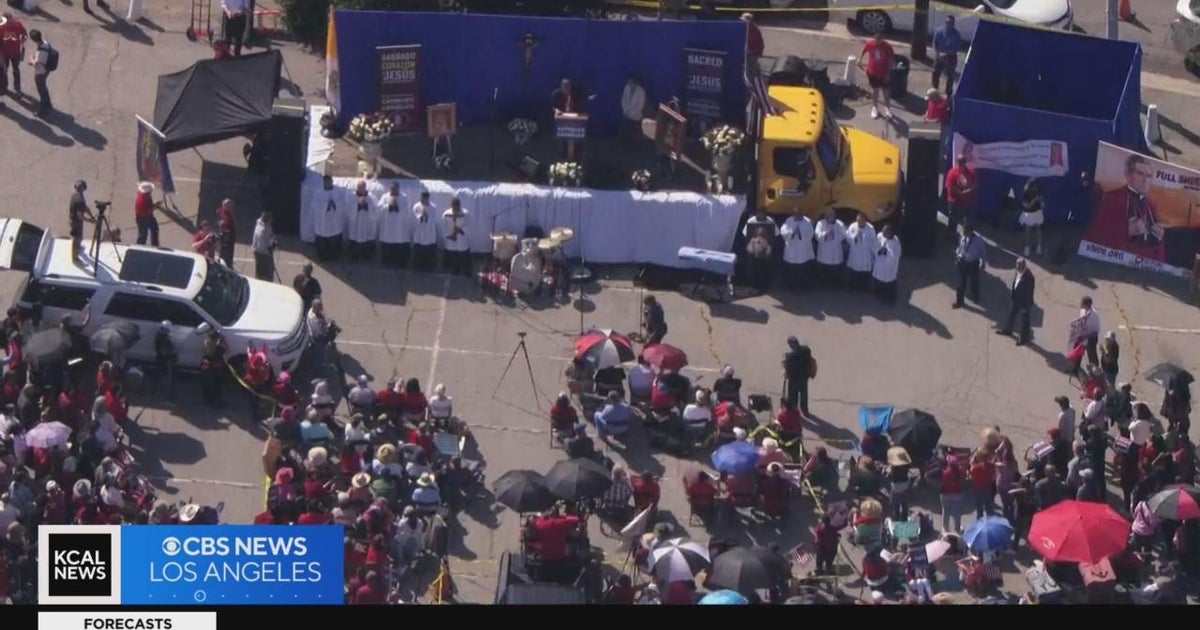 Protesters gather in parking lot outside Dodger Stadium - CBS Los Angeles