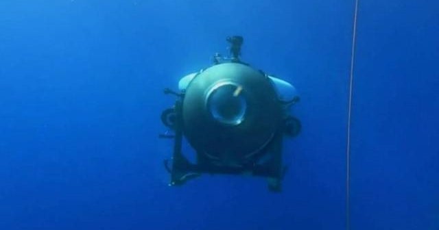 Debris field found in search area for missing Titanic sub, Coast Guard ...
