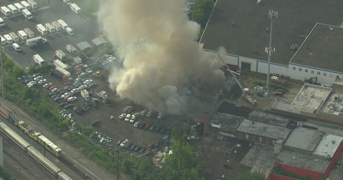 Crews battle junkyard fire in West Philadelphia - CBS Philadelphia