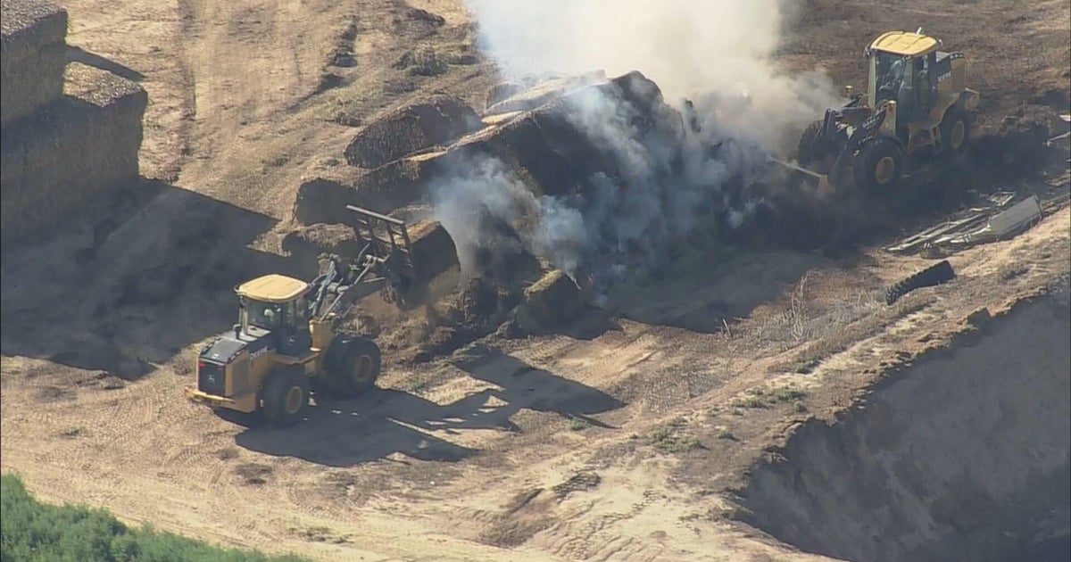 Large plume of smoke billows from burning haystacks in Weld County ...