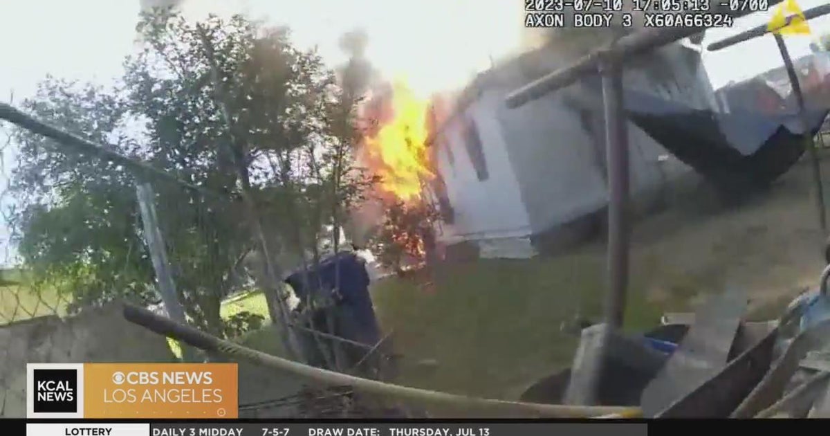 Bodycam video: Police officer rescues dog from fire - CBS Los Angeles