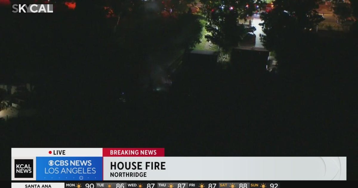 Firefighters in Northridge battle flames consuming home - CBS Los Angeles