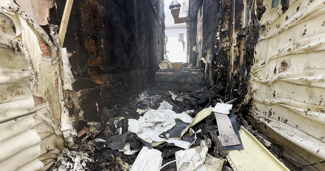 Residents try to salvage items after fire destroys apartments in ...
