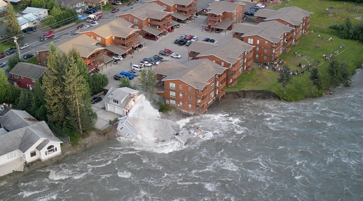 "Glacial outburst" flooding destroys at least 2 buildings, prompts ...