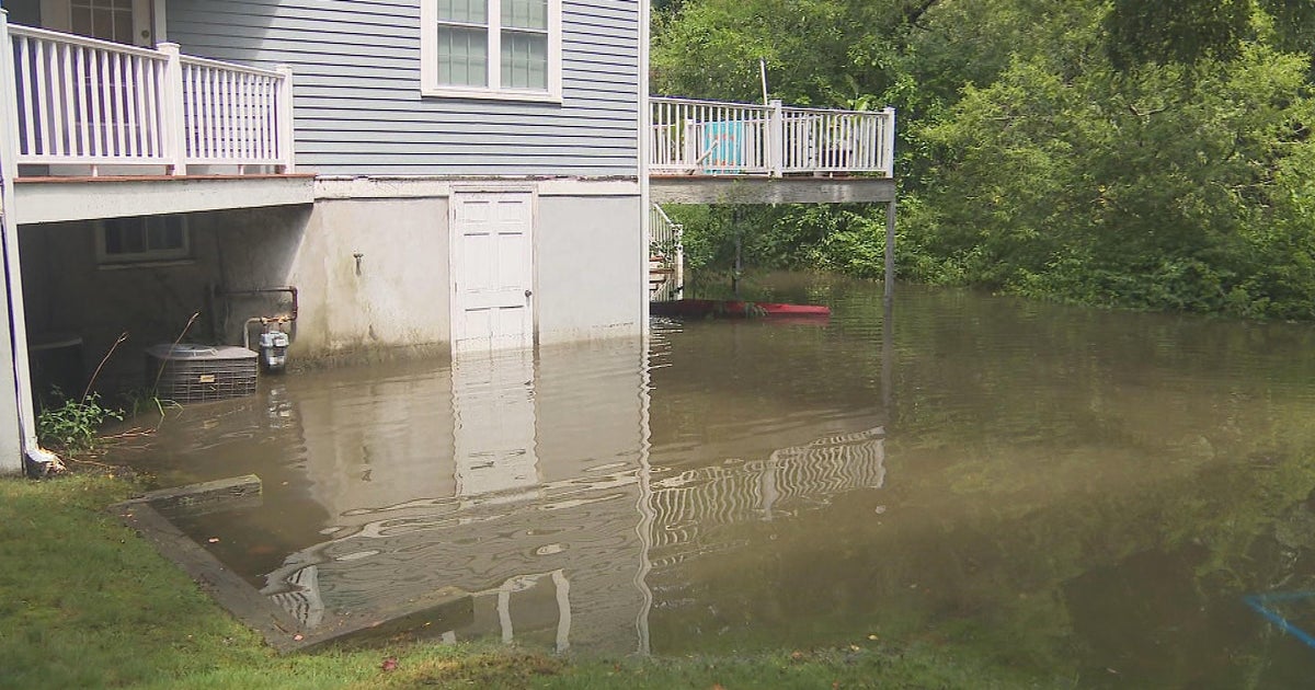 Heavy rain floods homes, businesses in Newton - CBS Boston