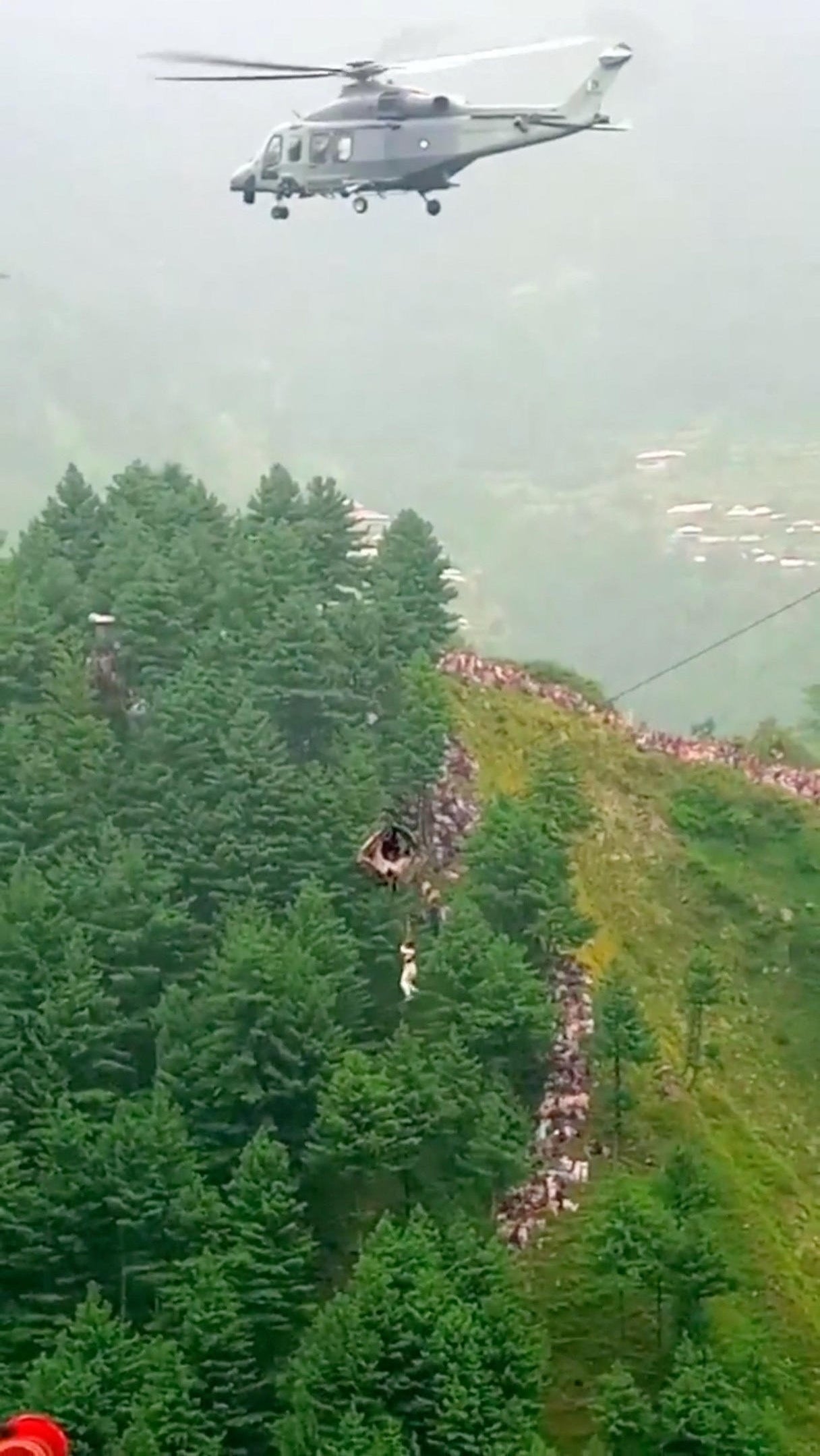 All 8 people rescued from cable car dangling hundreds of feet above ...