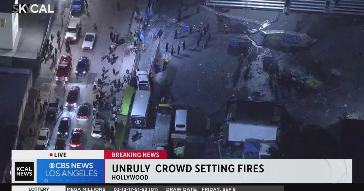 Unruly crowd setting fires in Hollywood - CBS Los Angeles