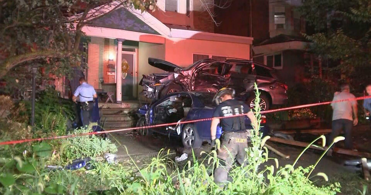 1 dead, 1 hospitalized after car strikes another car, then residence - CBS Philadelphia