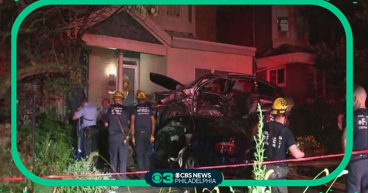 1 dead, 1 hospitalized after car strikes another car, then residence - CBS Philadelphia