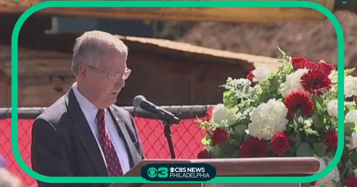 Hundreds gather for vigil for Temple University's acting president ...