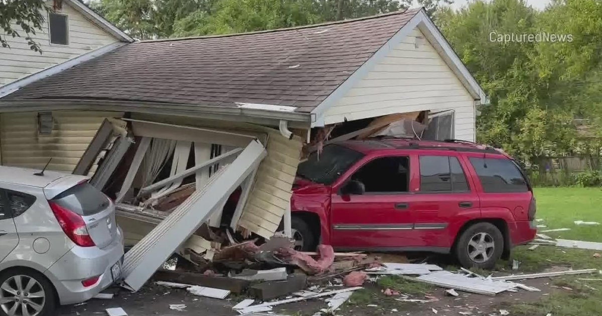 Car crashes into home stopping just inches from sleeping homeowner ...