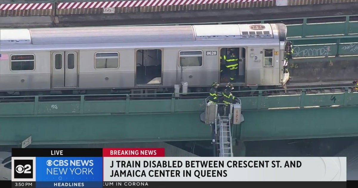Chopper 2 over disabled J train in Queens - CBS New York