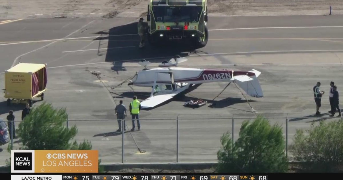 Strong winds flip plane upside down at John Wayne Airport - CBS Los Angeles