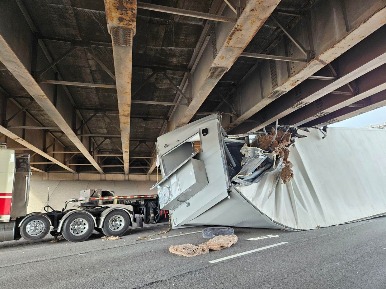 Westbound I-70 reopens at C470 after oversized load gets stuck under ...