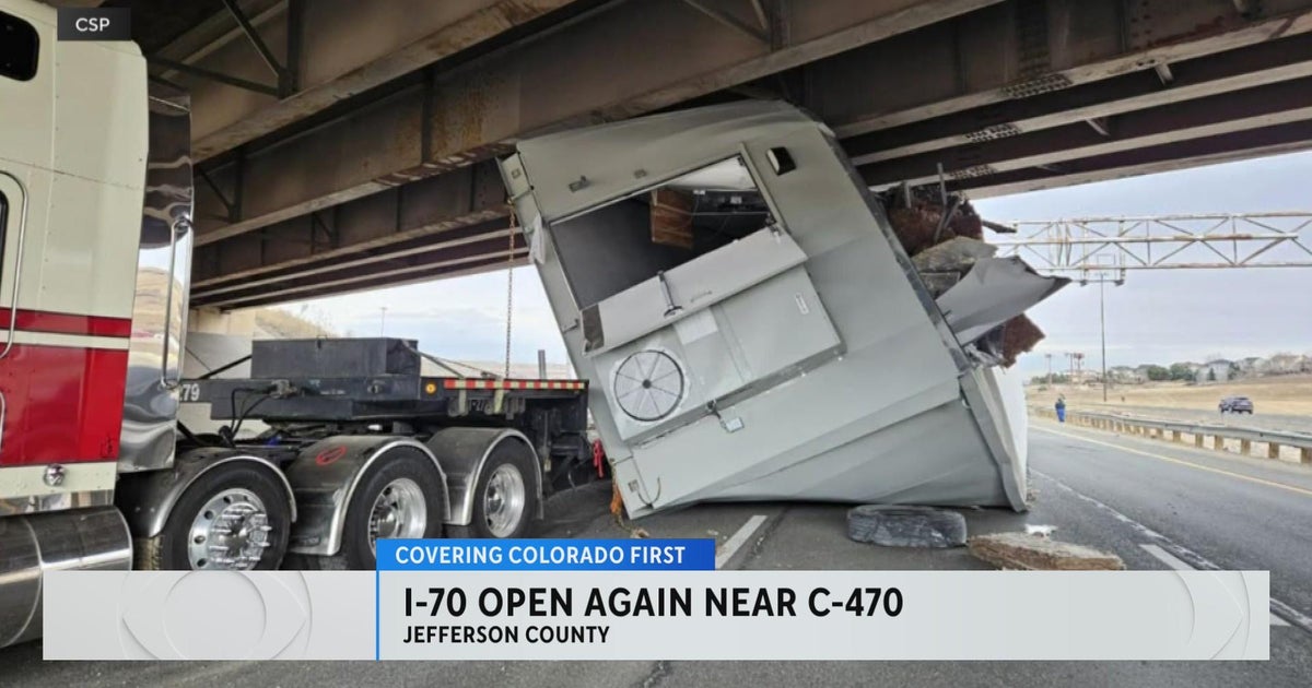 Westbound I-70 reopens at C470 after oversized load gets stuck under bridge in Colorado - CBS ...