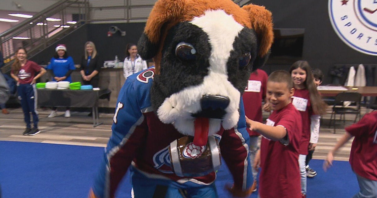 Colorado Avalanche players help train Gust Elementary School students ...