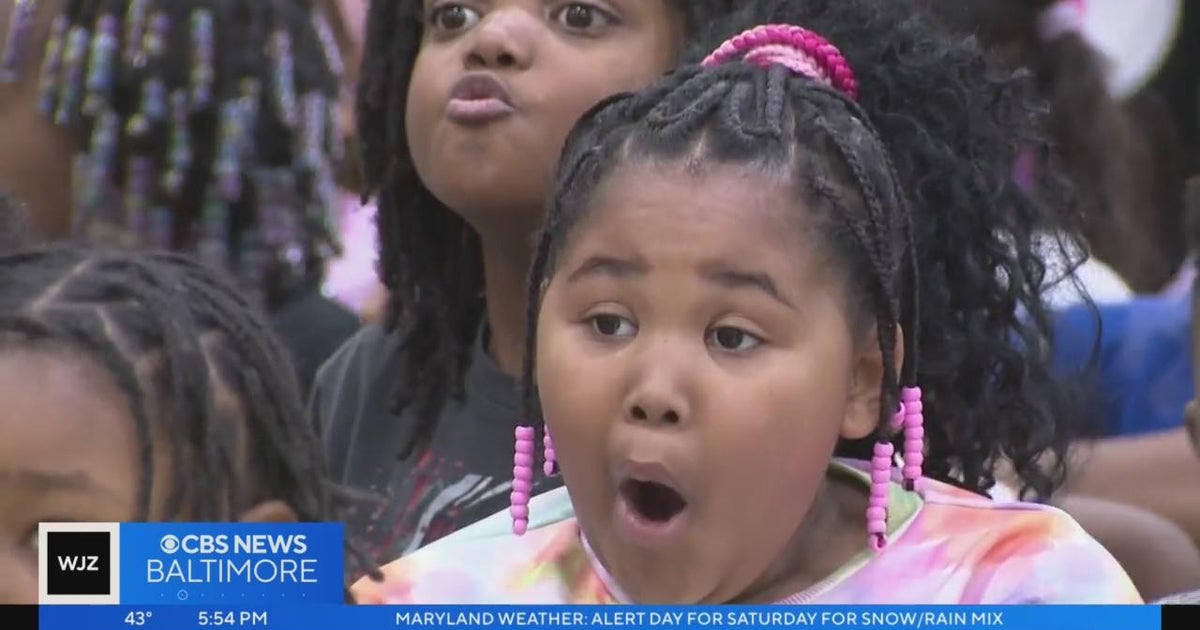 Professional basketball player from Baltimore returns to hometown ...