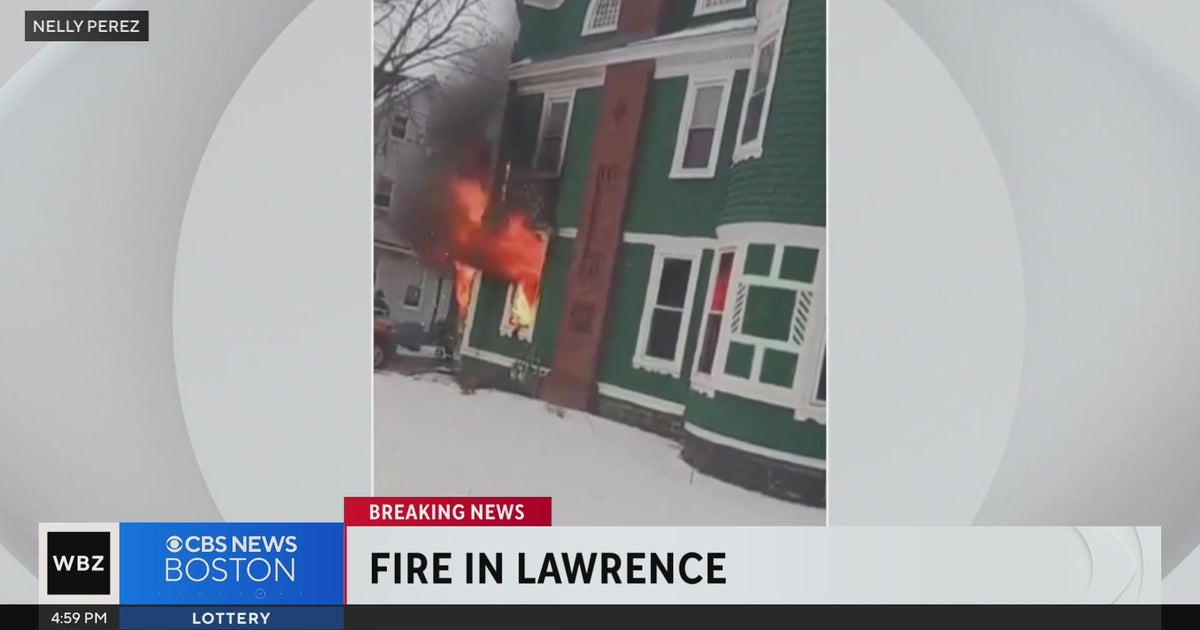Firefighters rescue person from fire in Lawrence - CBS Boston