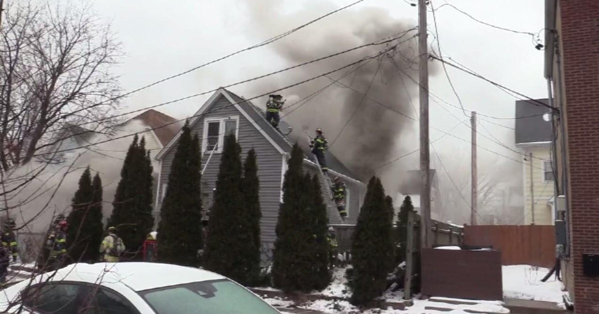 2 firefighters injured, cat dead in house fire in Chicago suburb - CBS ...