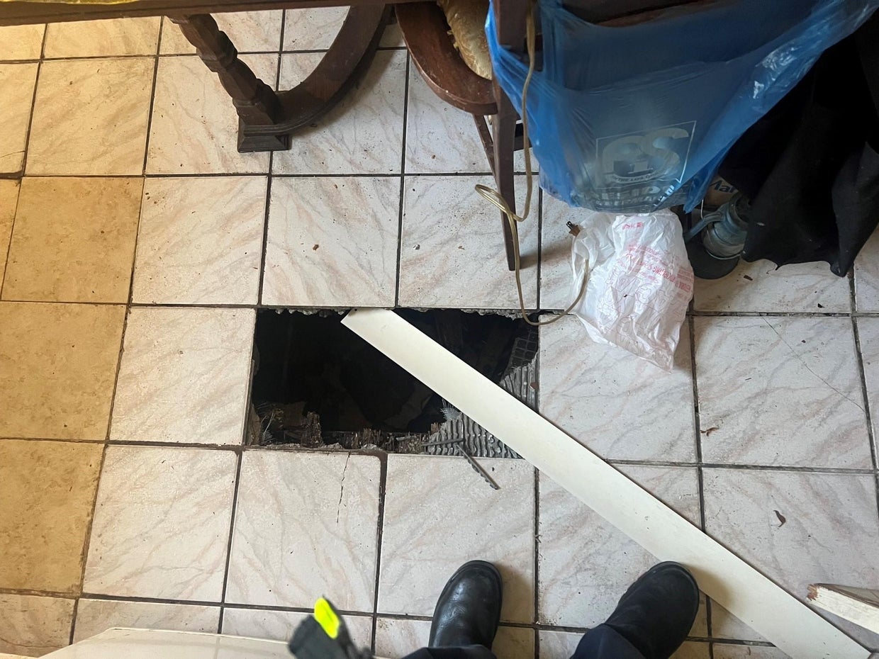 Miami Fire-Rescue crew pulls elderly woman from hole that opened in ...