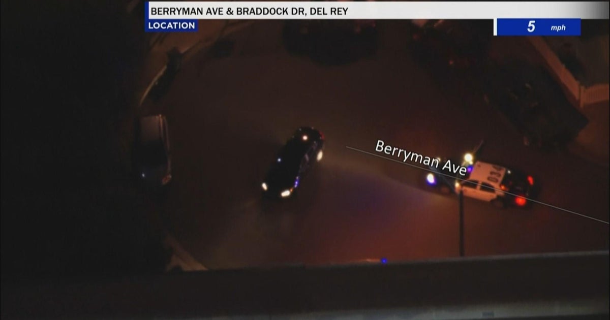 Armed home invasion suspect ditches car and runs into apartment during ...