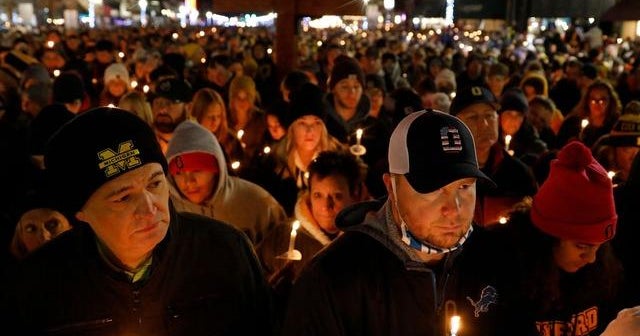 New gun safety laws take effect in Michigan - CBS News