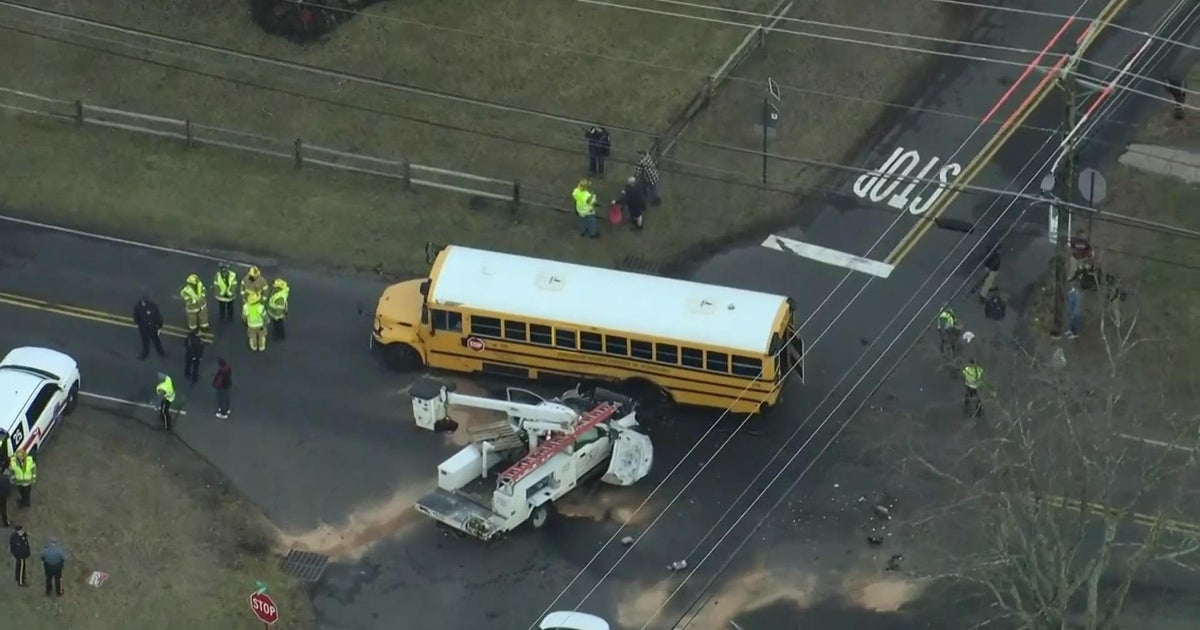 14 students taken to hospital after school bus, pickup truck collide in ...