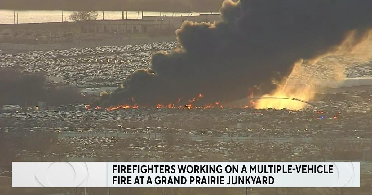 Firefighters battling fire at Grand Prairie junkyard - CBS Texas