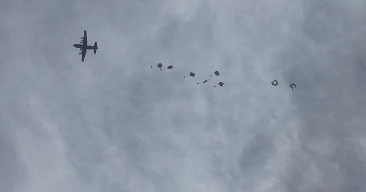 U.S. military carries out food airdrops in Gaza - CBS News